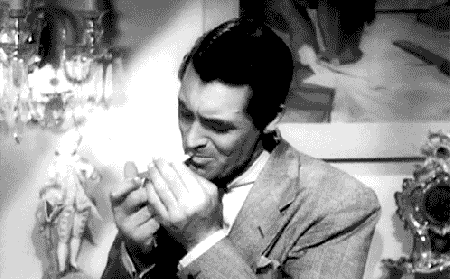 Cary Grant, having a smoke (GIF – click to activate) | MATTHEW'S ISLAND