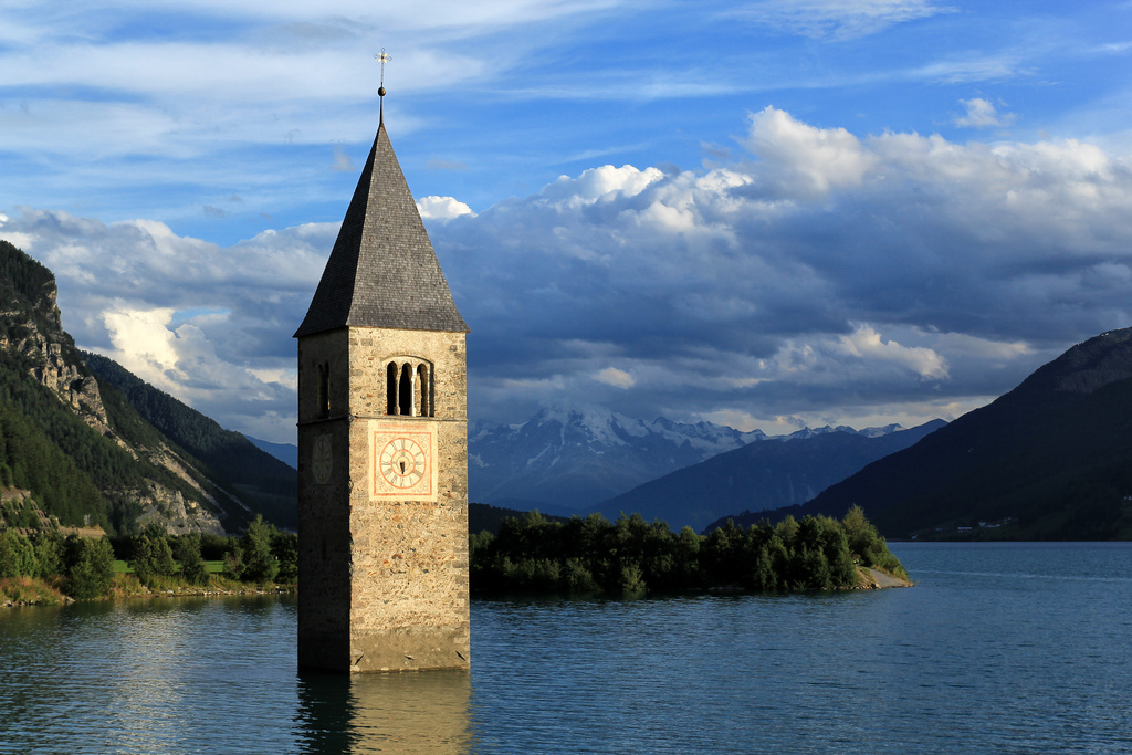 Clock tower in a lake in Northern Italy (A village that Mussolini ...