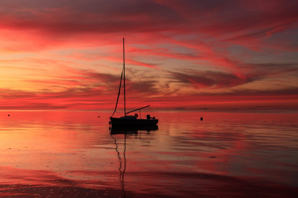 Sunset with a boat | MATTHEW'S ISLAND